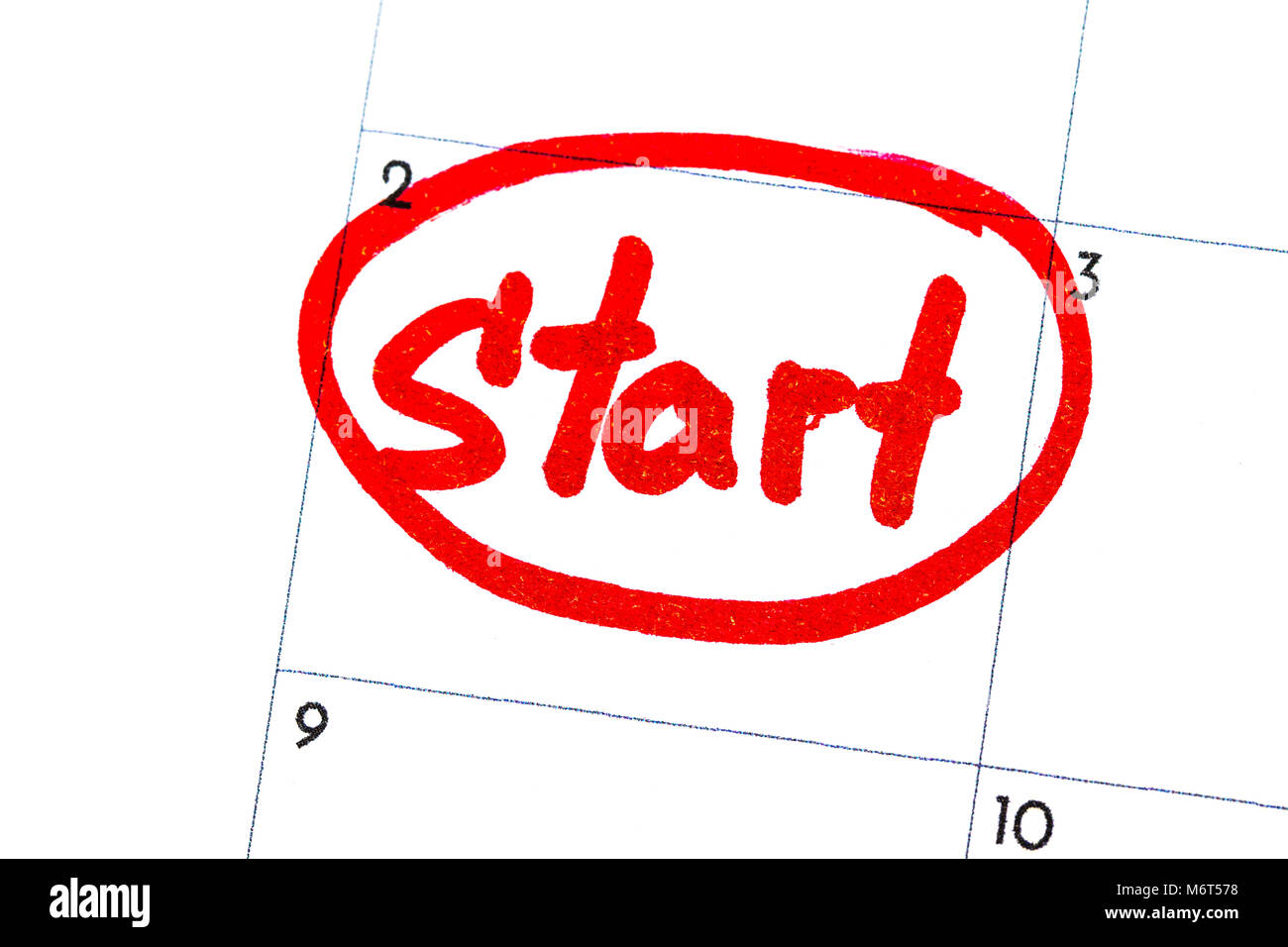 "start" is the text written on the calendar with a black marker Stock ...