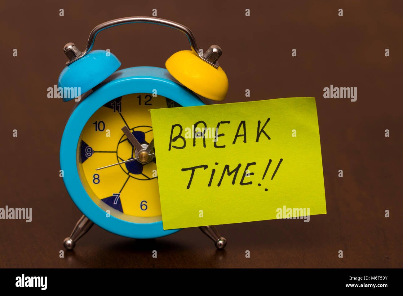 Break time concept with classic alarm clock Stock Photo - Alamy