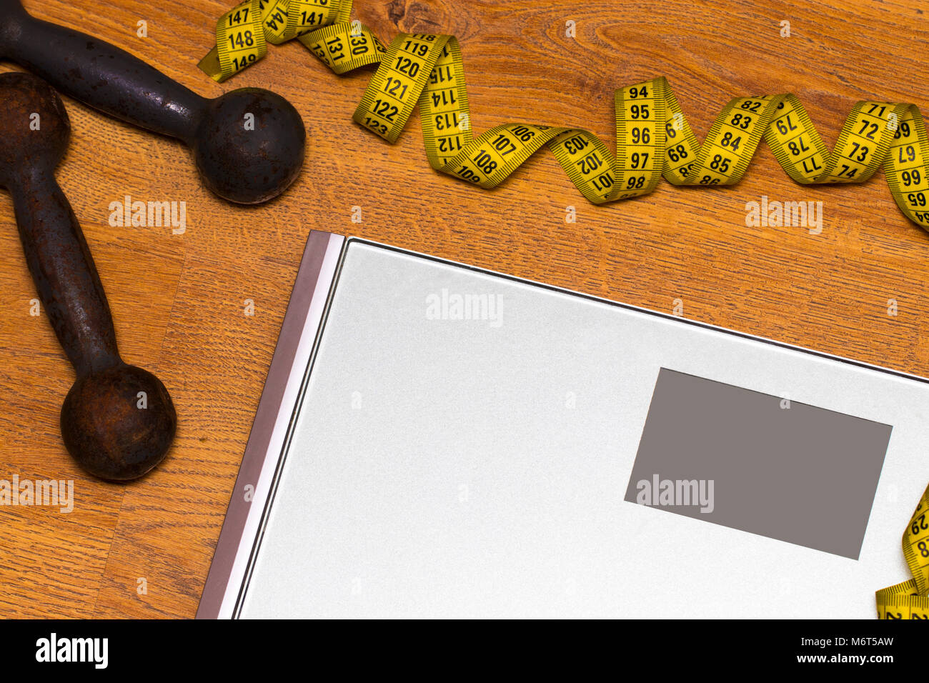 scale, jump rope, weights and tape measure, concept of diet and healthy ...