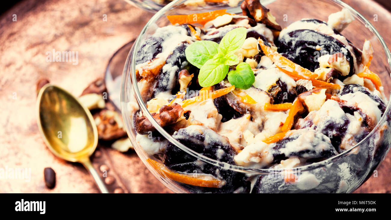 Desserts of Moldovan cuisine,prunes stuffed with nuts Stock Photo - Alamy