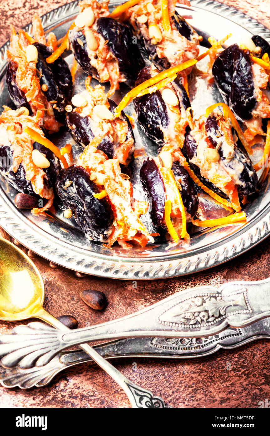 Desserts of Moldovan cuisine,prunes stuffed with nuts Stock Photo - Alamy