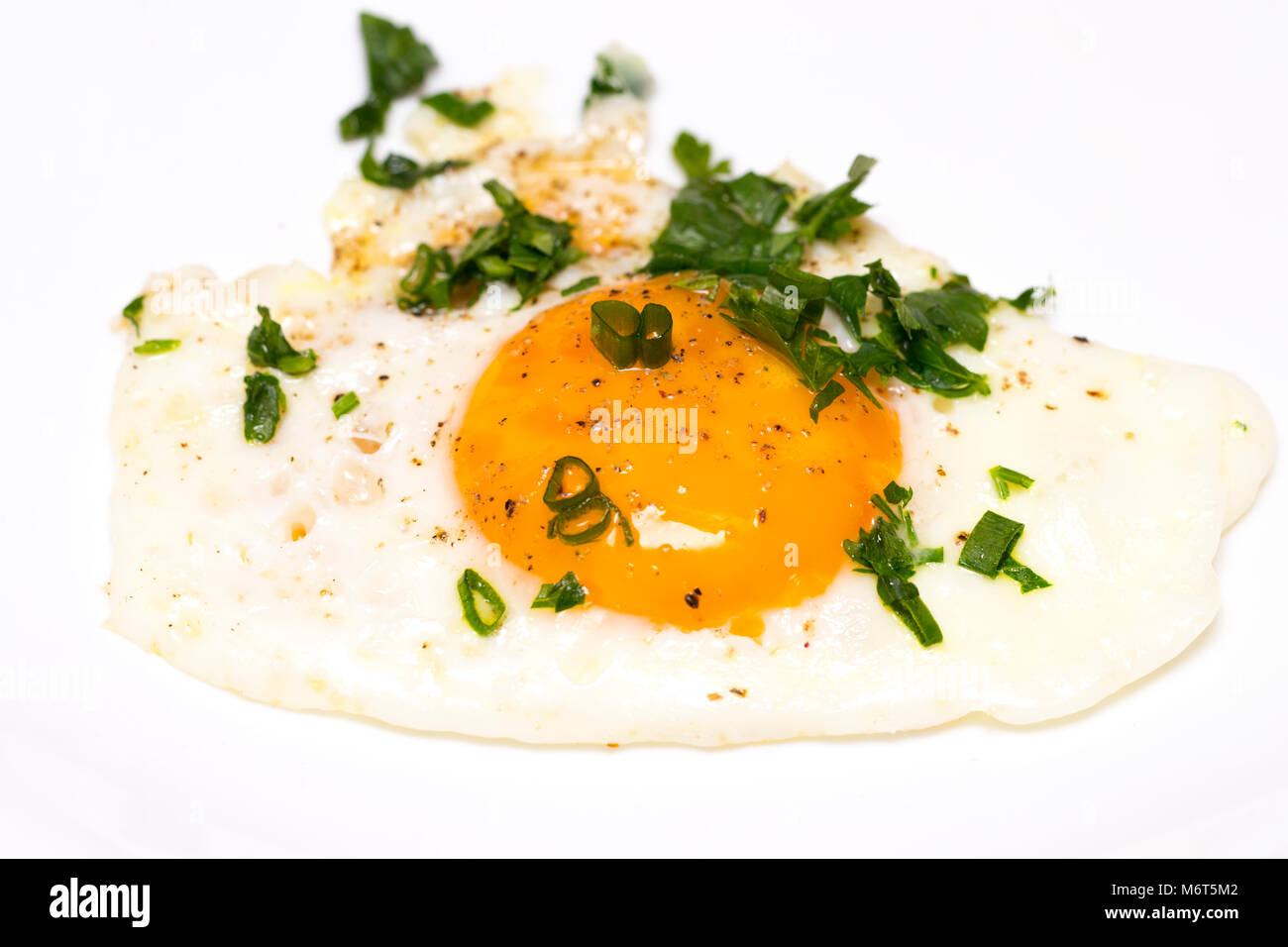 Fried egg isolated on white background for Breakfast Stock Photo - Alamy