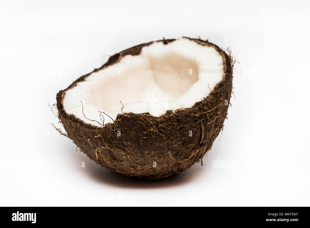 Half coconut top view isolated on white Stock Photo - Alamy