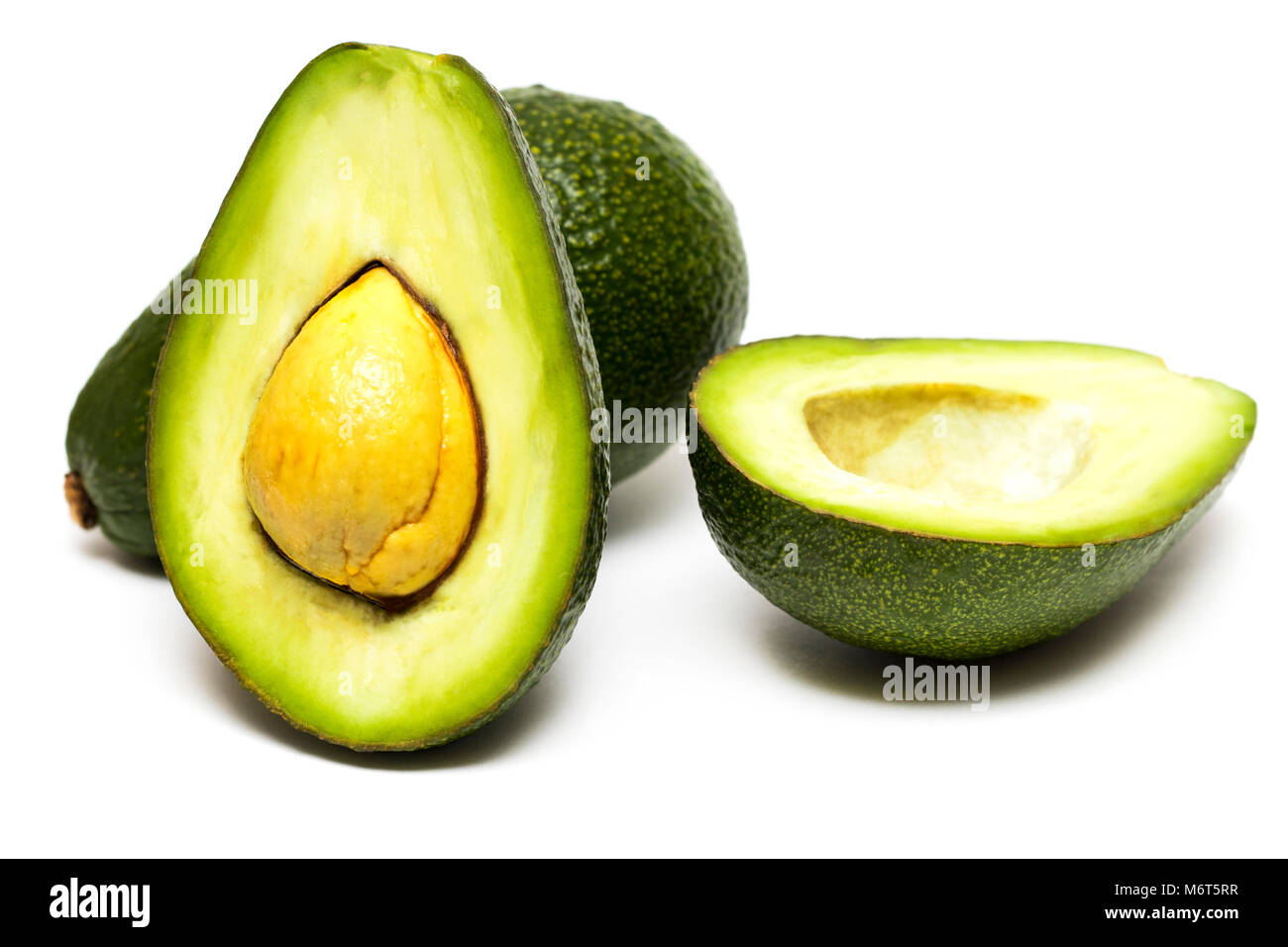 Half of fresh avocado isolated on white Stock Photo - Alamy