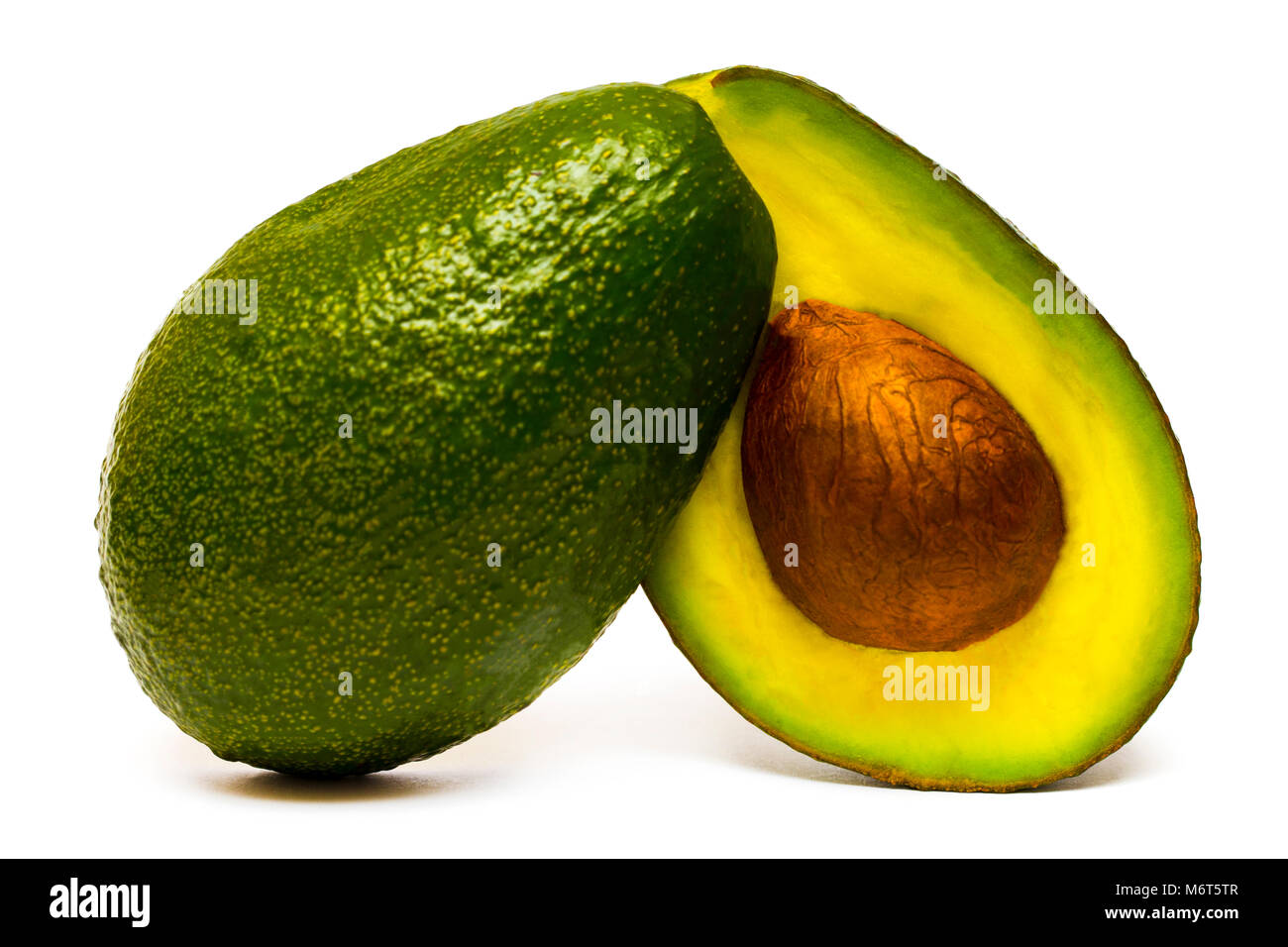 Half of fresh avocado isolated on white Stock Photo - Alamy