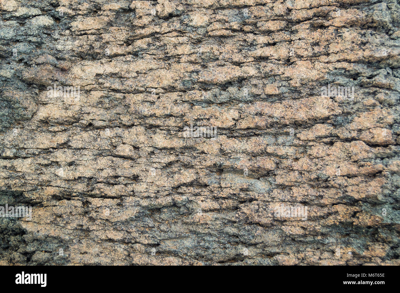 Texture of a stone rock with geometric lines. Background for layout or ...