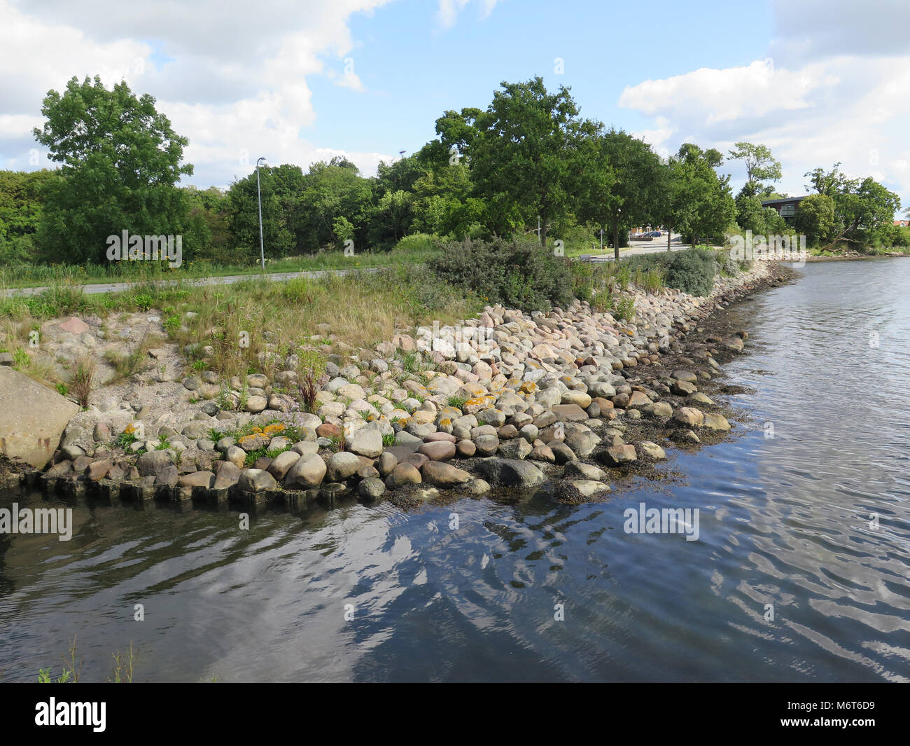 Low tide in small inlet in Denmarks southeast coast Stock Photo - Alamy