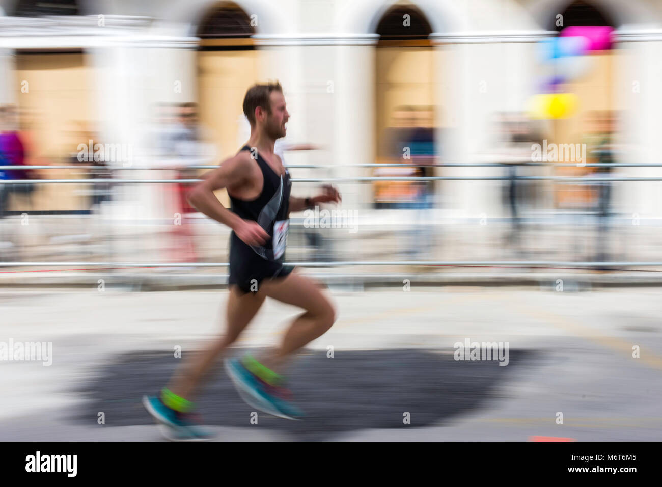 Blurred Marathon runner Stock Photo - Alamy