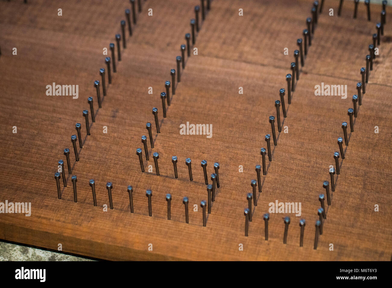 Nail driven into wood hi-res stock photography and images - Alamy