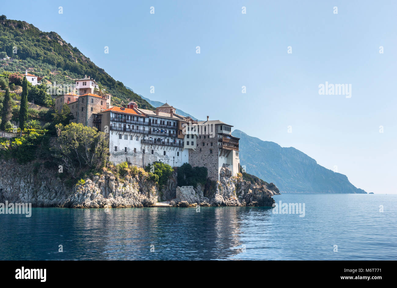 Osiou Gregoriou monastery seen from the sea. On The Athos peninsula ...