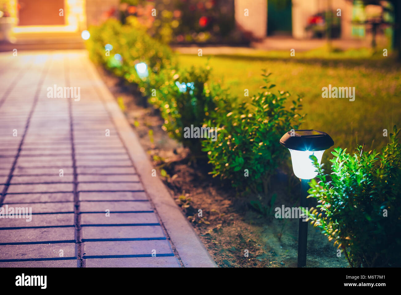 Decorative Small Solar Garden Light, Lanterns In Flower Bed In Green ...