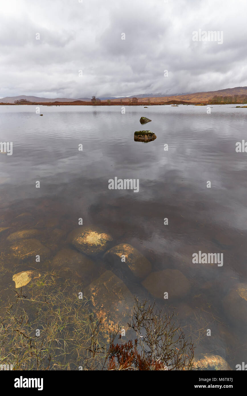 Loch Ba with Gin clear water on Rannoch Moor, at the head of Glen Coe ...