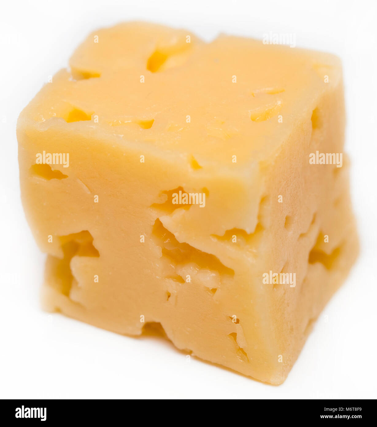 Cube of cheese isolated on a white background Stock Photo - Alamy