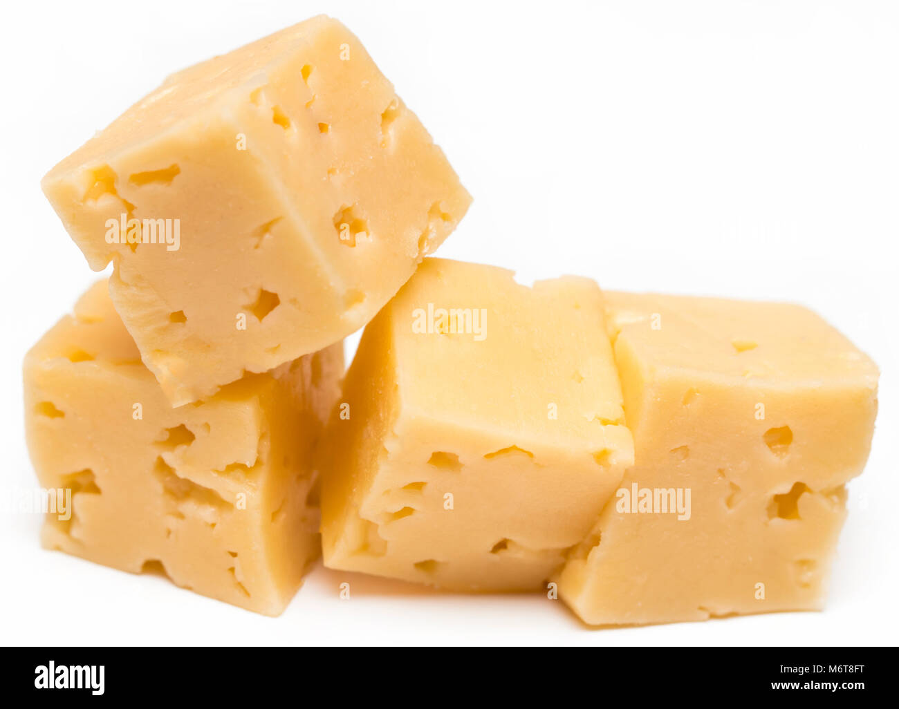 Cube of cheese isolated on a white background Stock Photo - Alamy