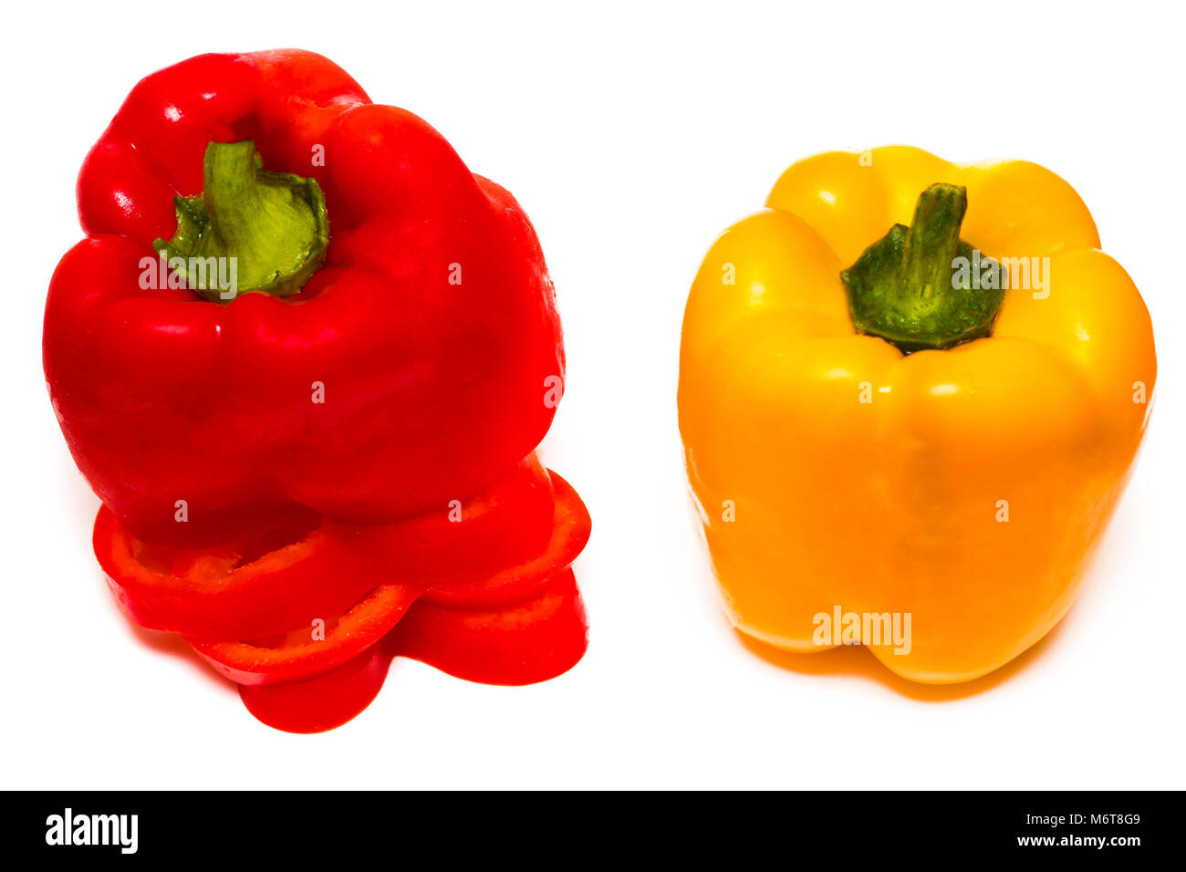 Red and yellow pepper isolated on white background Stock Photo - Alamy