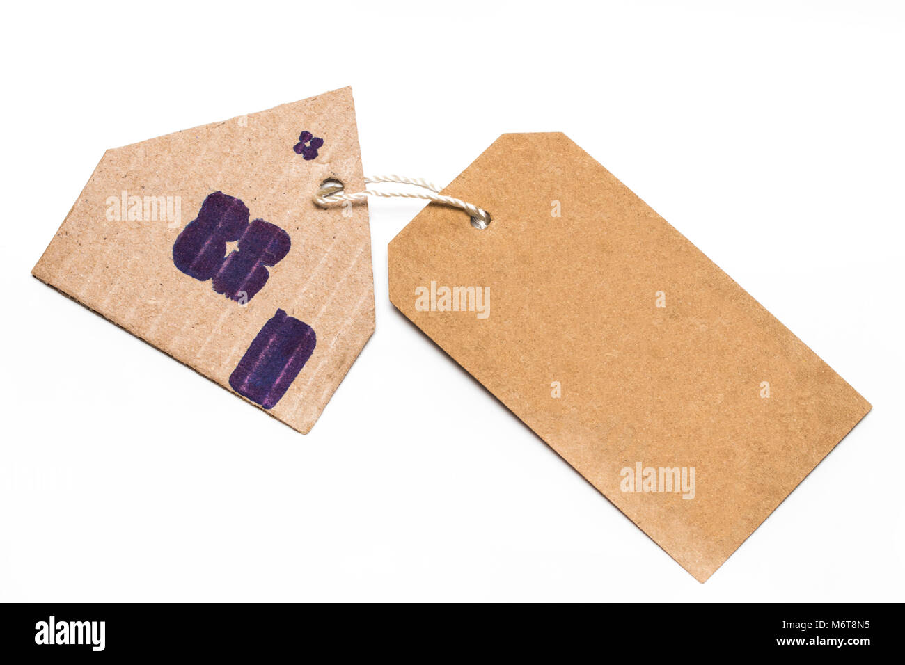 House with label isolated on white background Stock Photo - Alamy