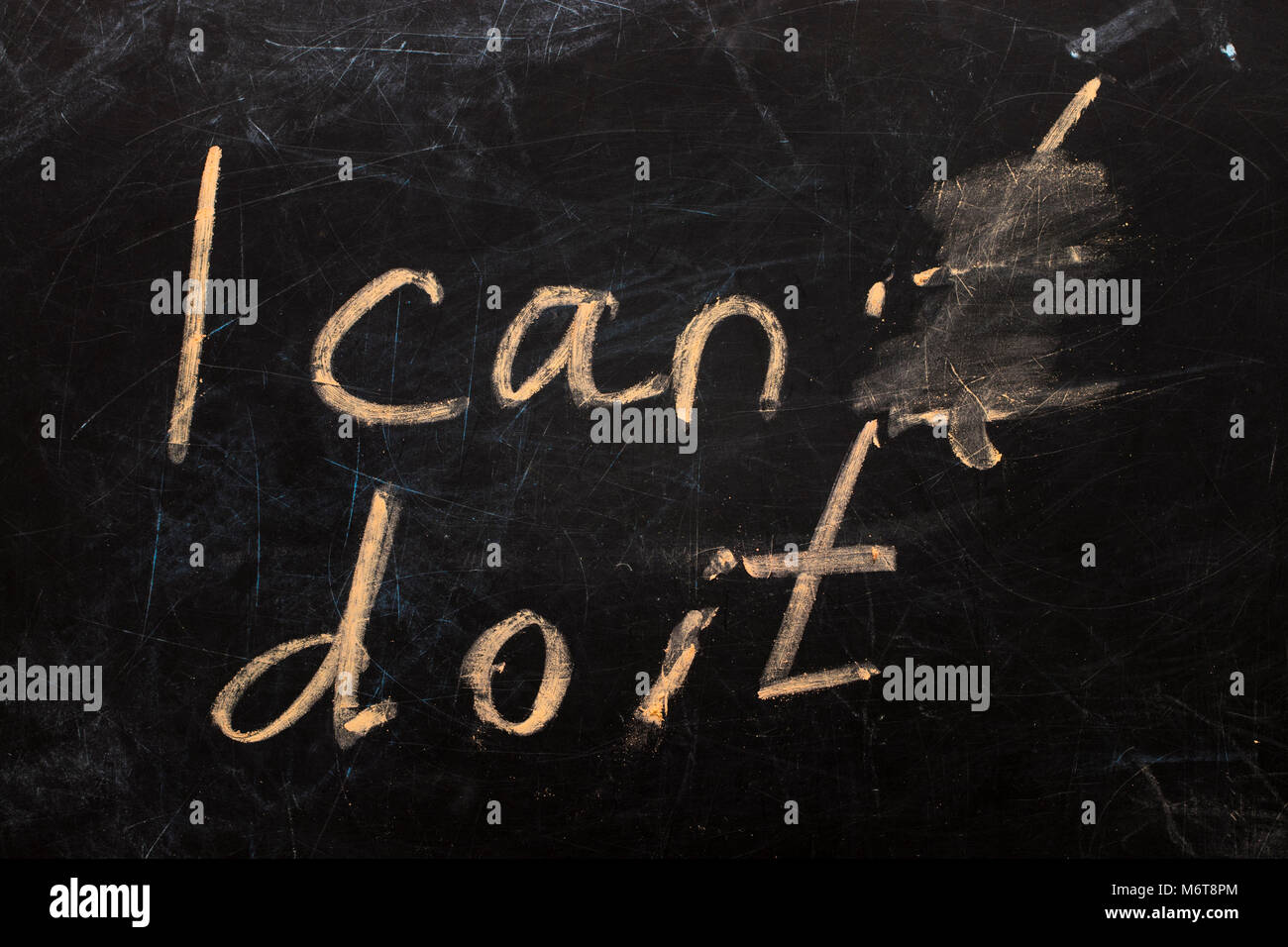 Changing the word I can't to I can do it text on blackboard background ...