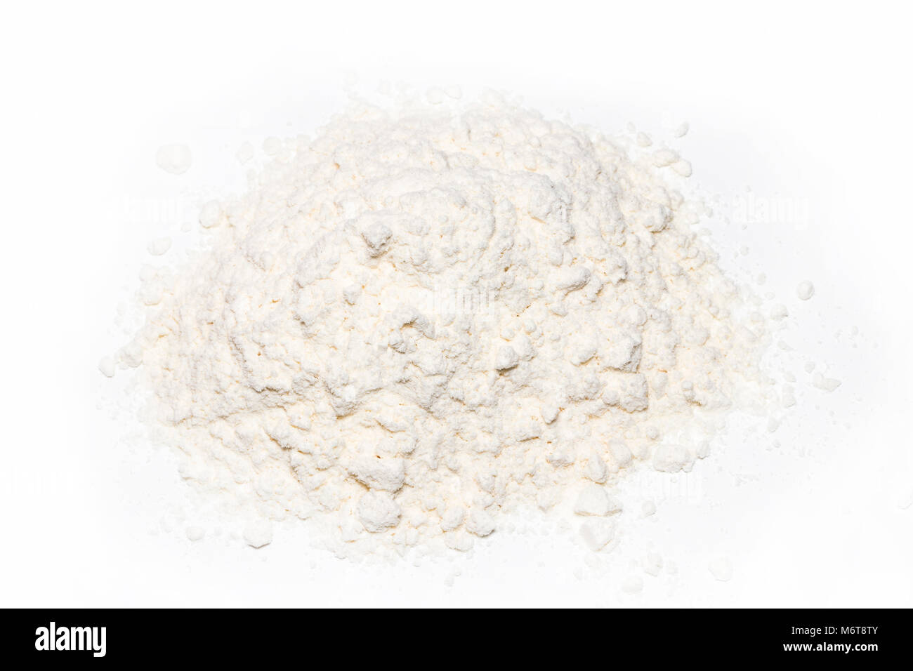 Pile of wheat flour isolated on white background Stock Photo - Alamy