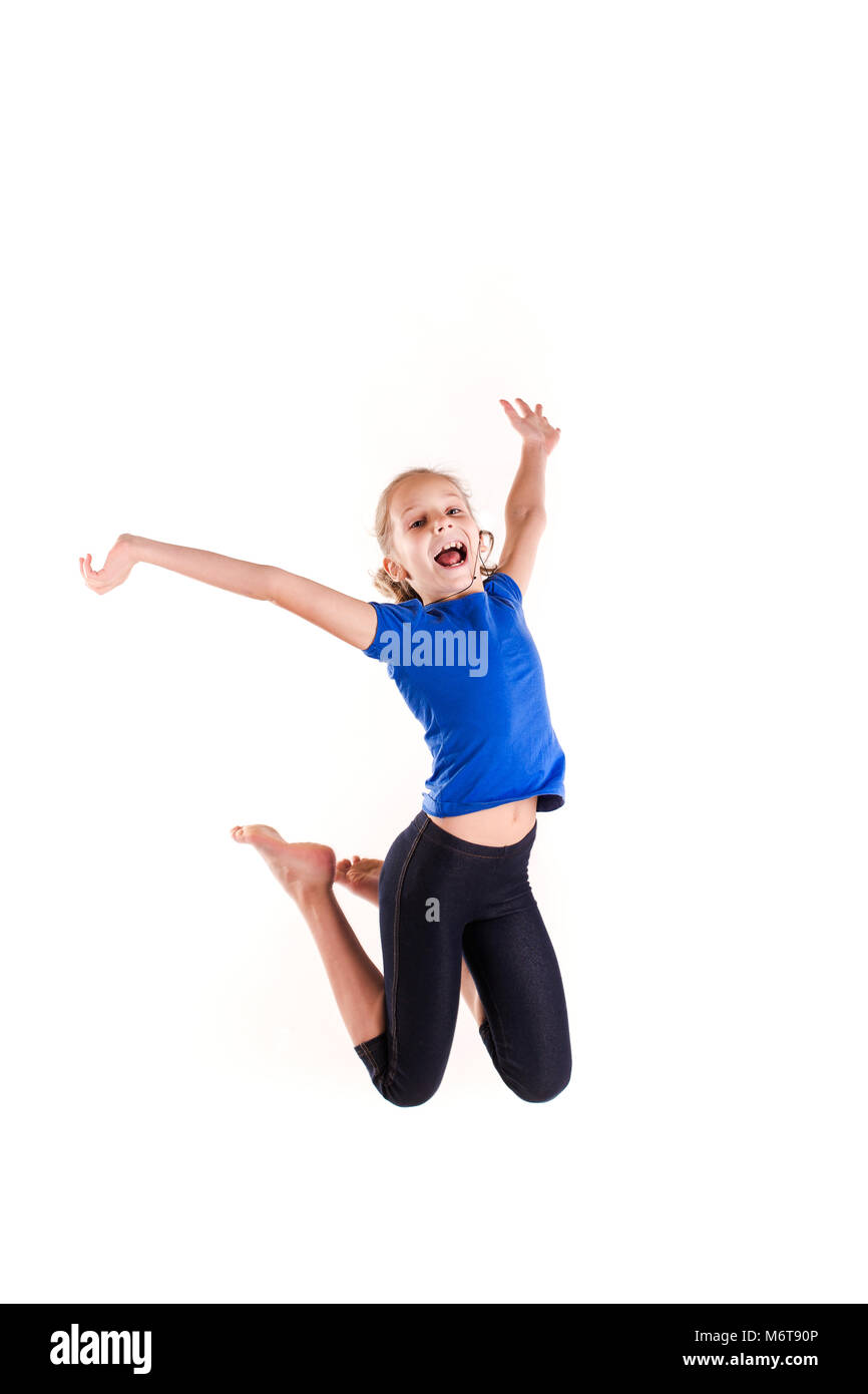 Active happy little girl jumping isolated on white Stock Photo - Alamy