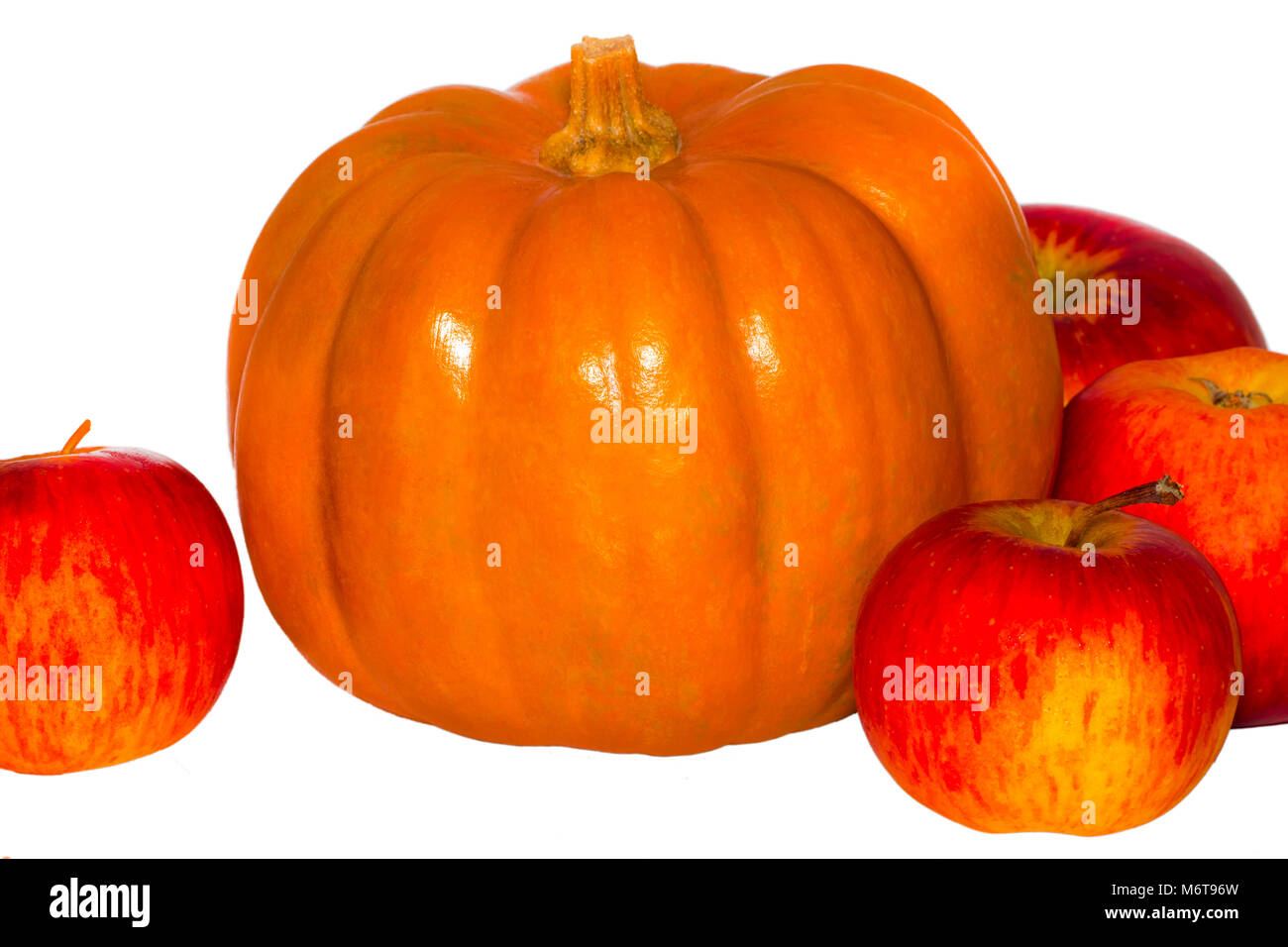 Pumpkin and apples isolated on white background Stock Photo - Alamy