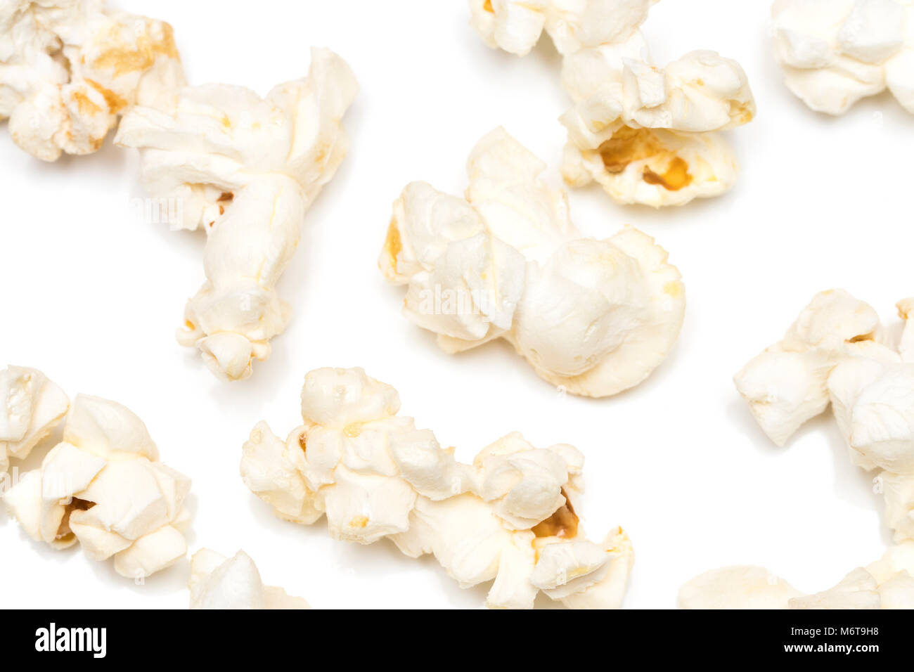 Popcorn isolated on a white background. Closeup Stock Photo - Alamy