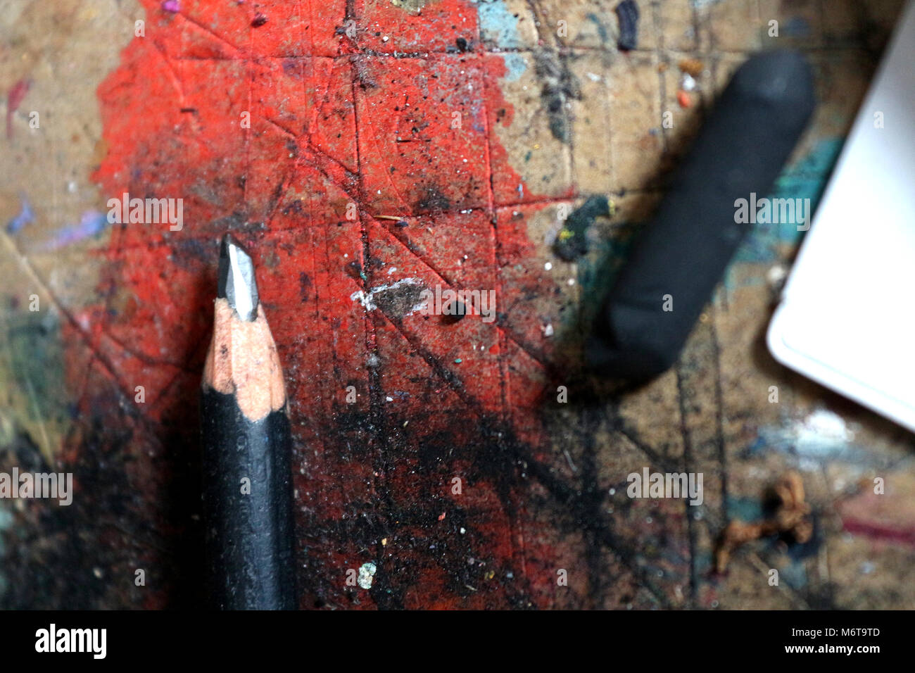 Pencil, Charcoal and spilled ink Stock Photo - Alamy