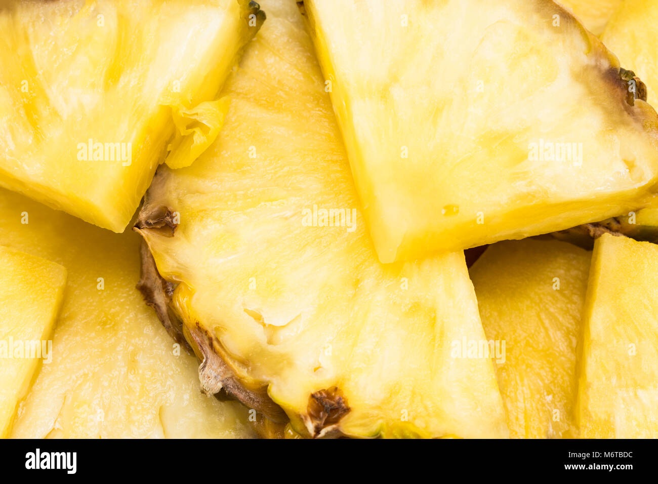 Beautiful texture slices of pineapple fruit close-up Stock Photo - Alamy