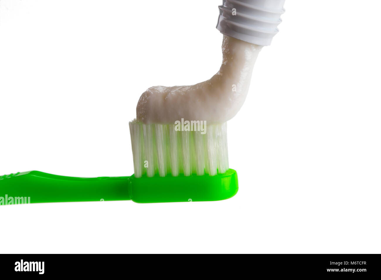 Toothbrush and toothpaste isolated on white background Stock Photo - Alamy