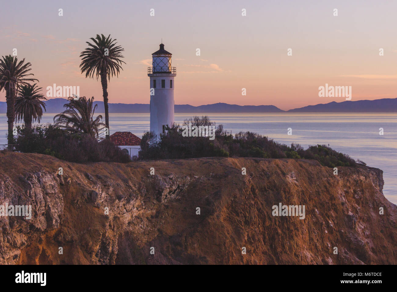 Beautiful coastal view of Point Vicente Lighthouse atop the steep cliffs of Rancho Palos Verdes ...