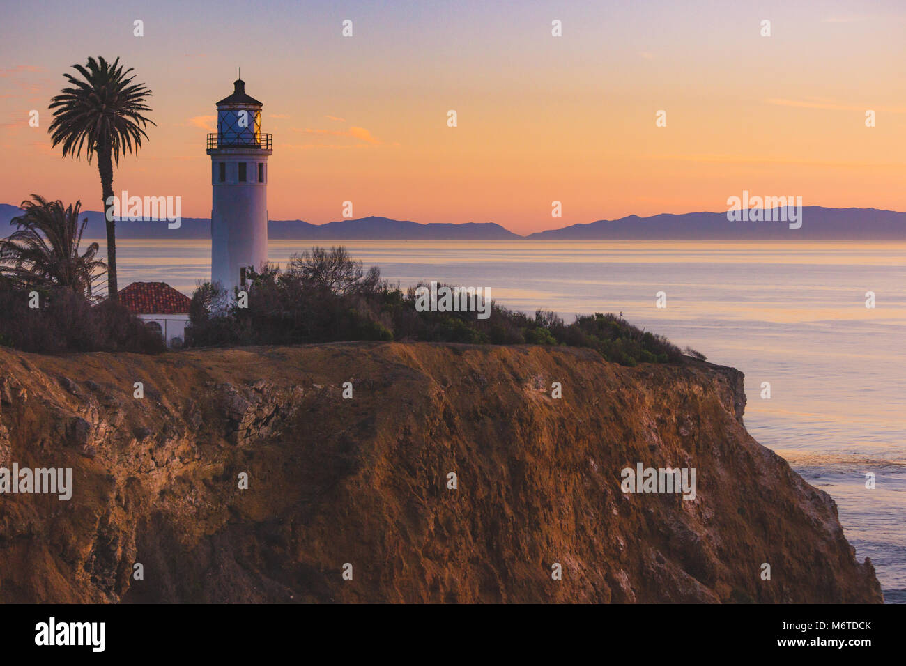 Beautiful coastal view of Point Vicente Lighthouse atop the steep cliffs of Rancho Palos Verdes ...