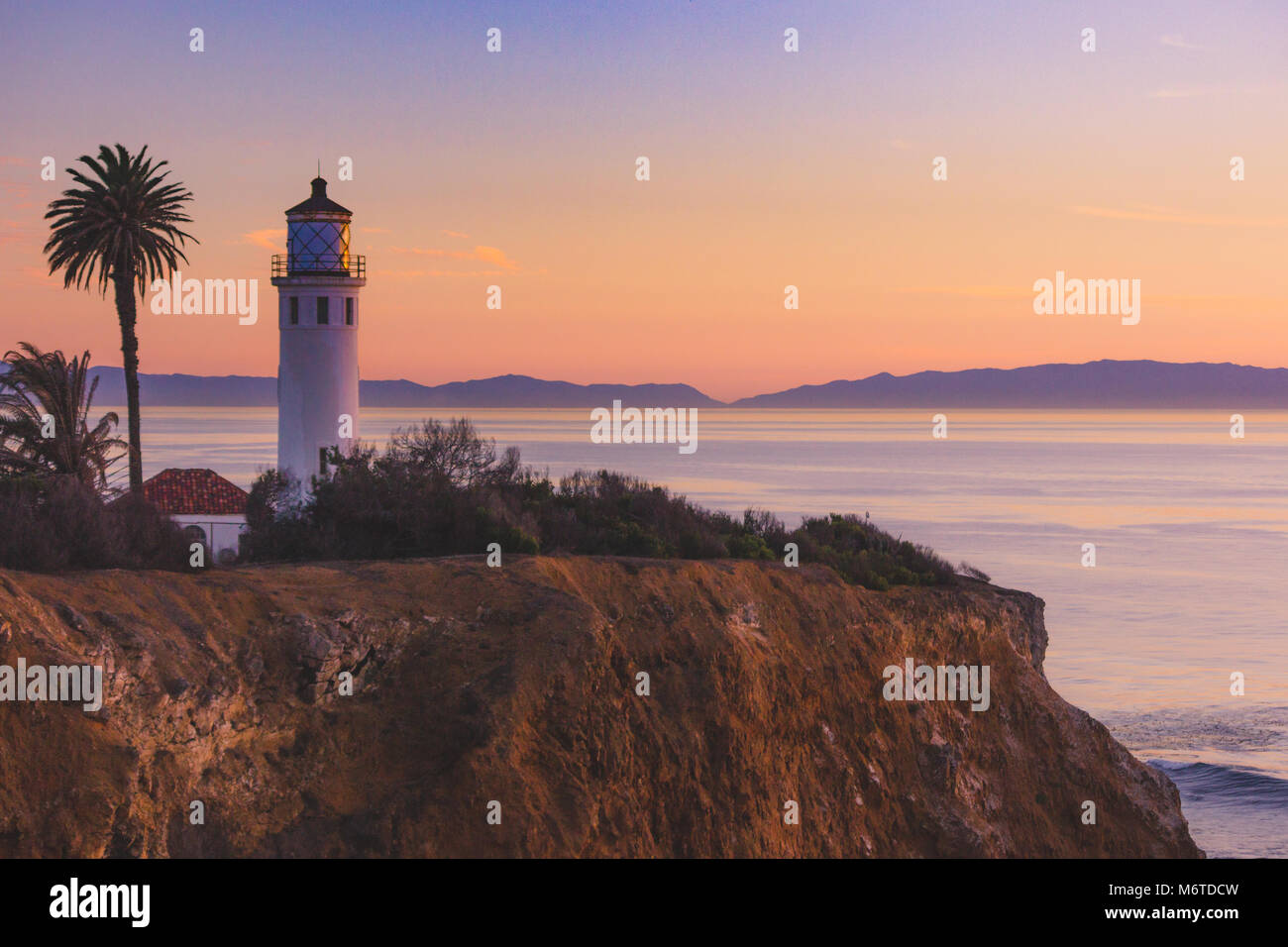 Beautiful coastal view of Point Vicente Lighthouse atop the steep cliffs of Rancho Palos Verdes ...