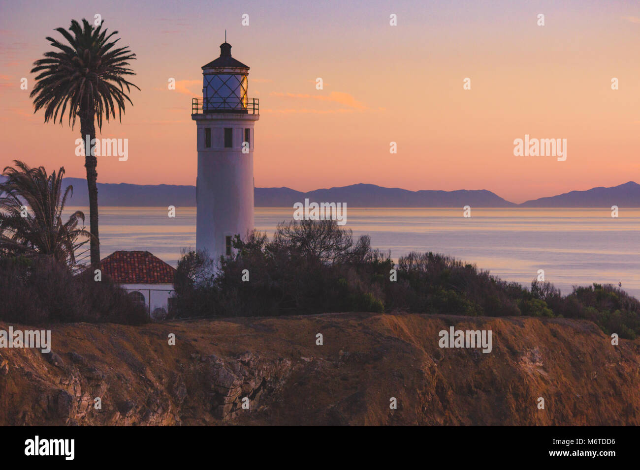 Beautiful coastal view of Point Vicente Lighthouse atop the steep cliffs of Rancho Palos Verdes ...