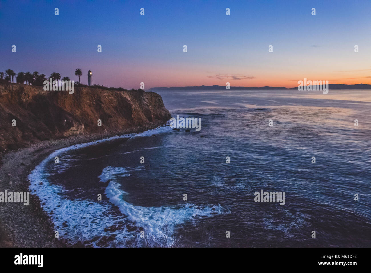Beautiful coastal view of Point Vicente Lighthouse atop the steep cliffs of Rancho Palos Verdes ...
