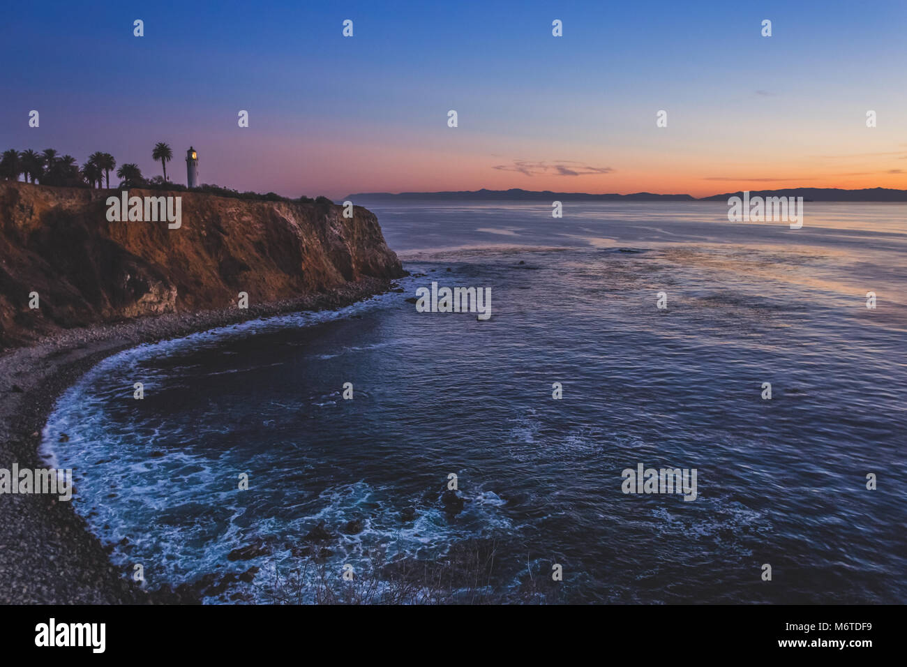 Beautiful coastal view of Point Vicente Lighthouse atop the steep cliffs of Rancho Palos Verdes ...
