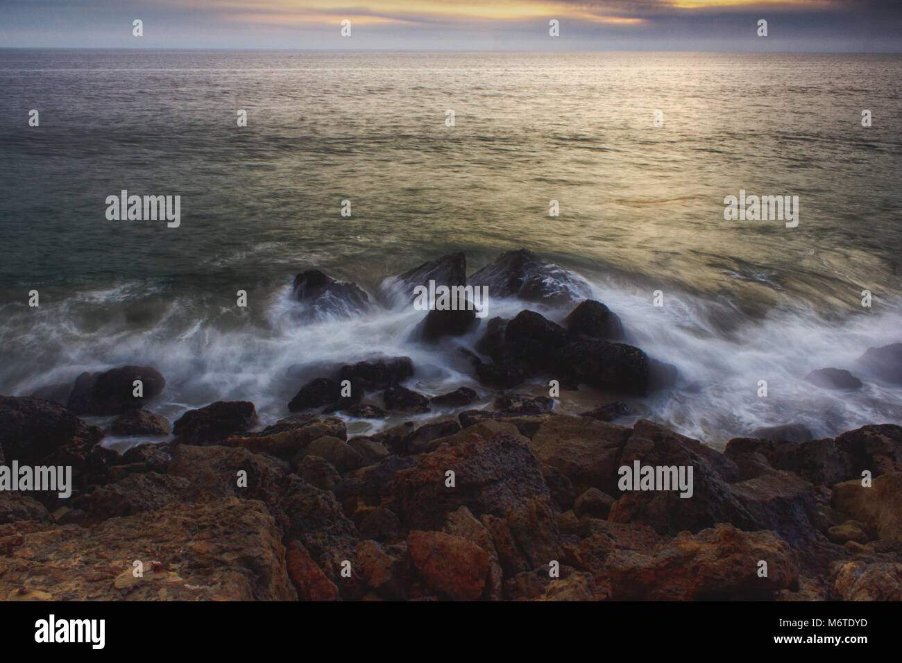 Amazing sunset along Point Dume State Beach with colorful sky, waves ...