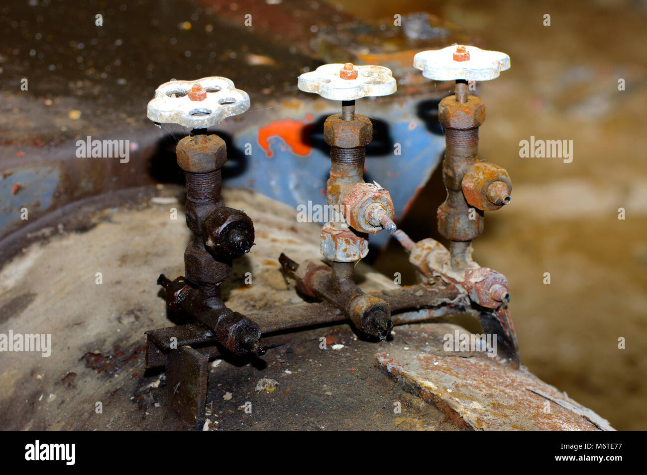 Old rusted metal taps hi-res stock photography and images - Alamy