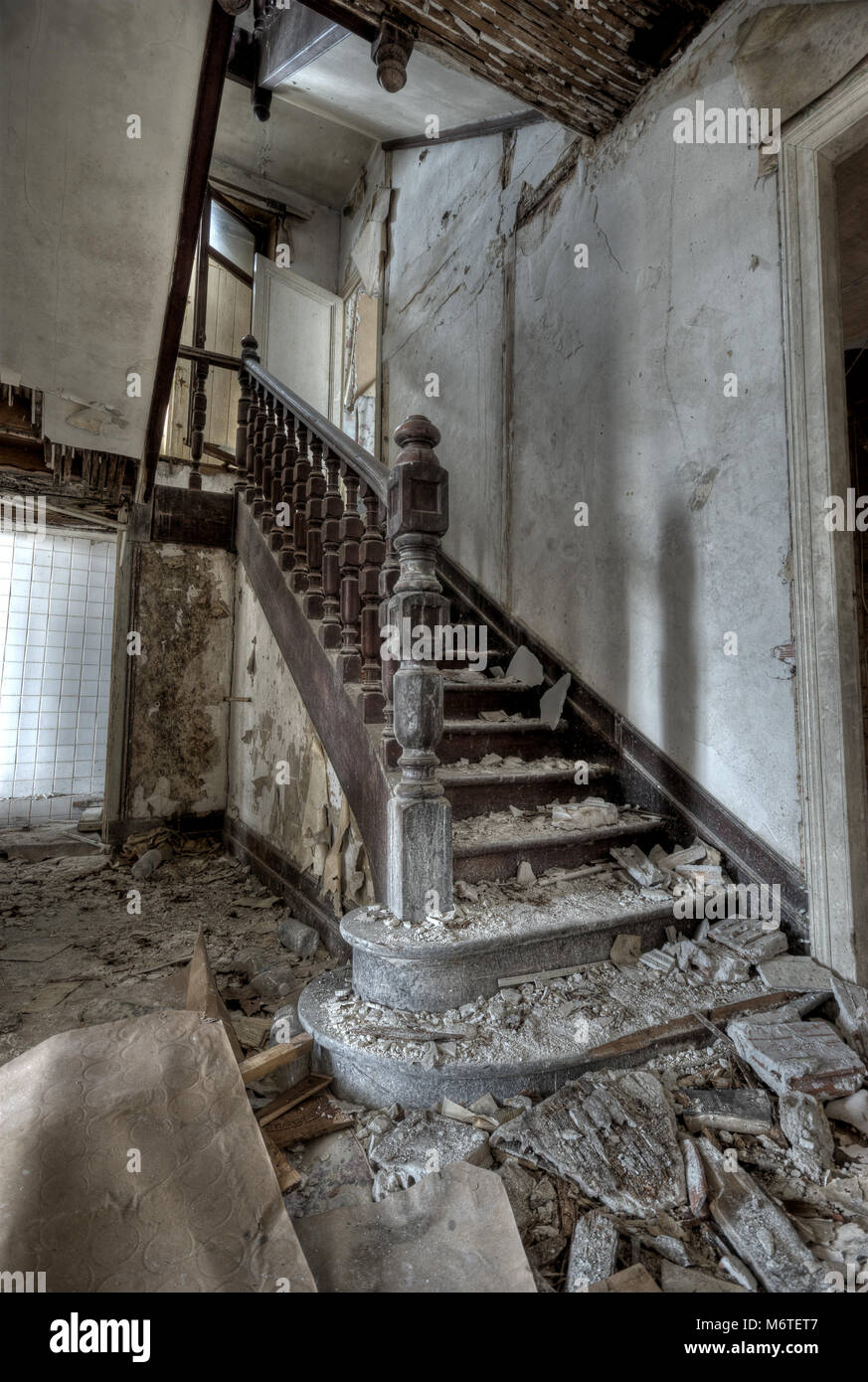 Ruined staircase in an abandoned house after water damage Stock Photo ...