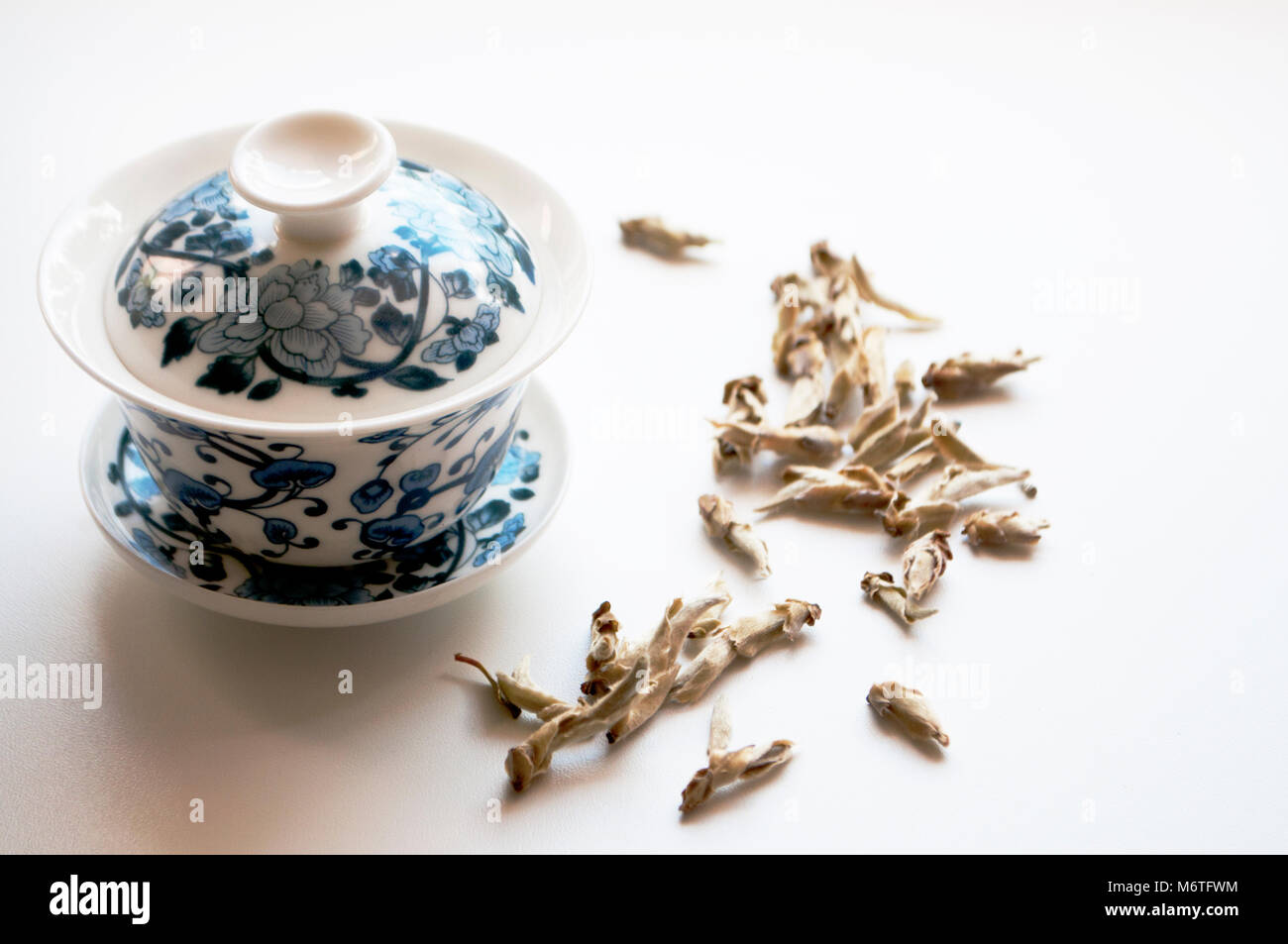Teacup in a chinese style on a white background Stock Photo - Alamy