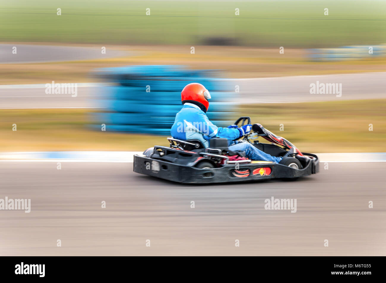 Fast carting car on track Stock Photo - Alamy