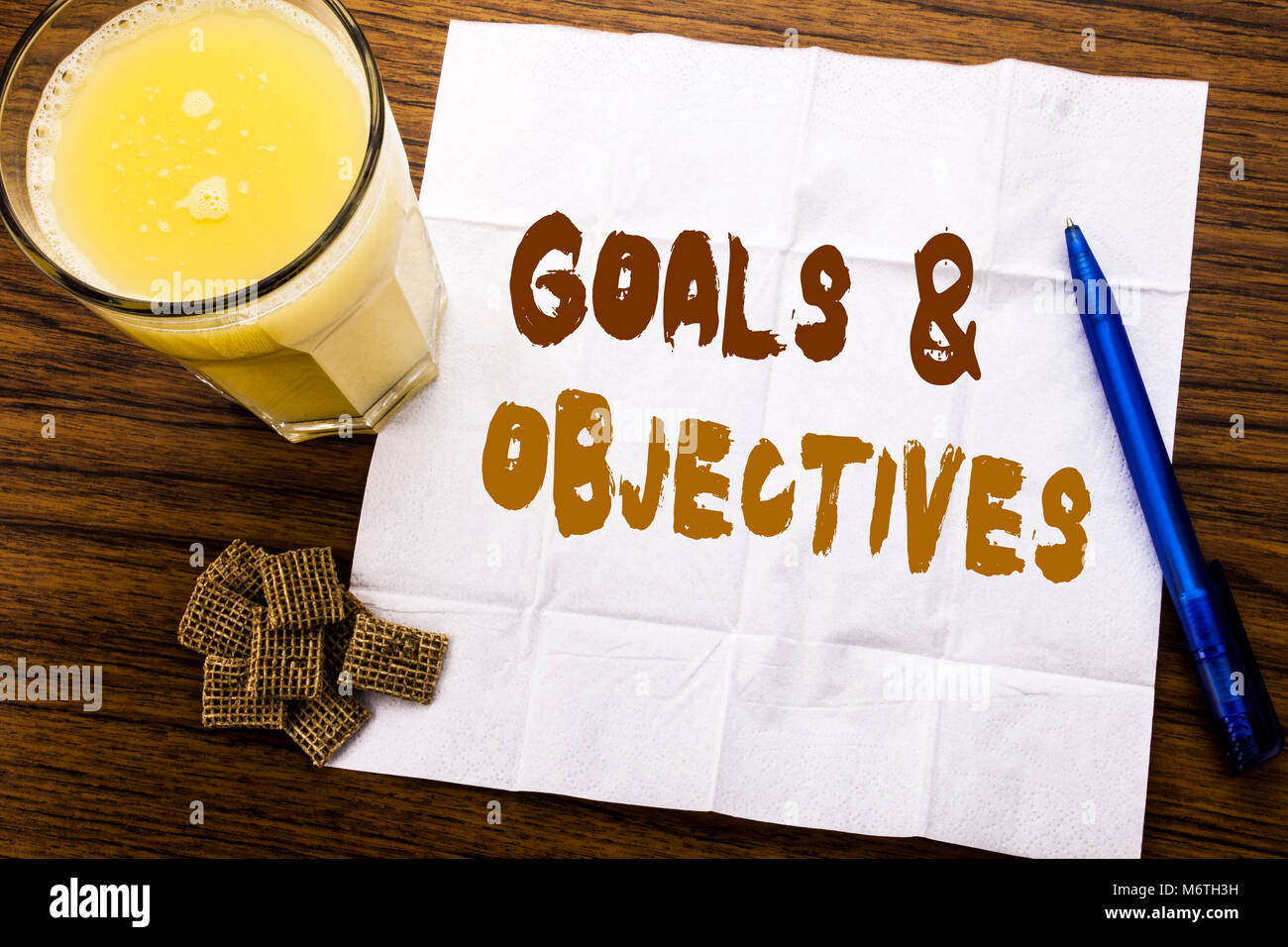 Handwriting Announcement text showing Goals Objectives. Business ...