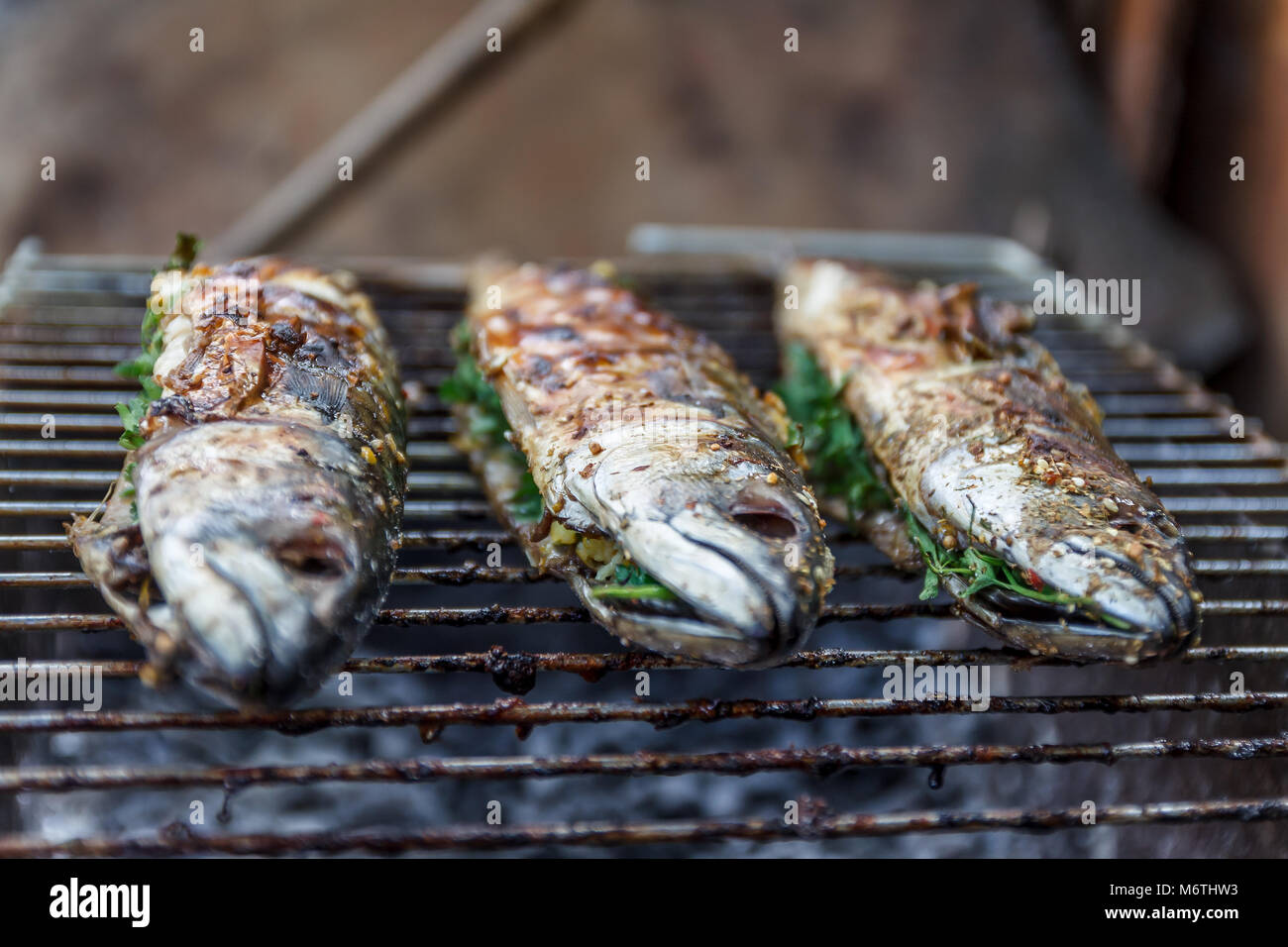 Roasted carcass fish mackerel cooked on the grill, top view, close-up ...