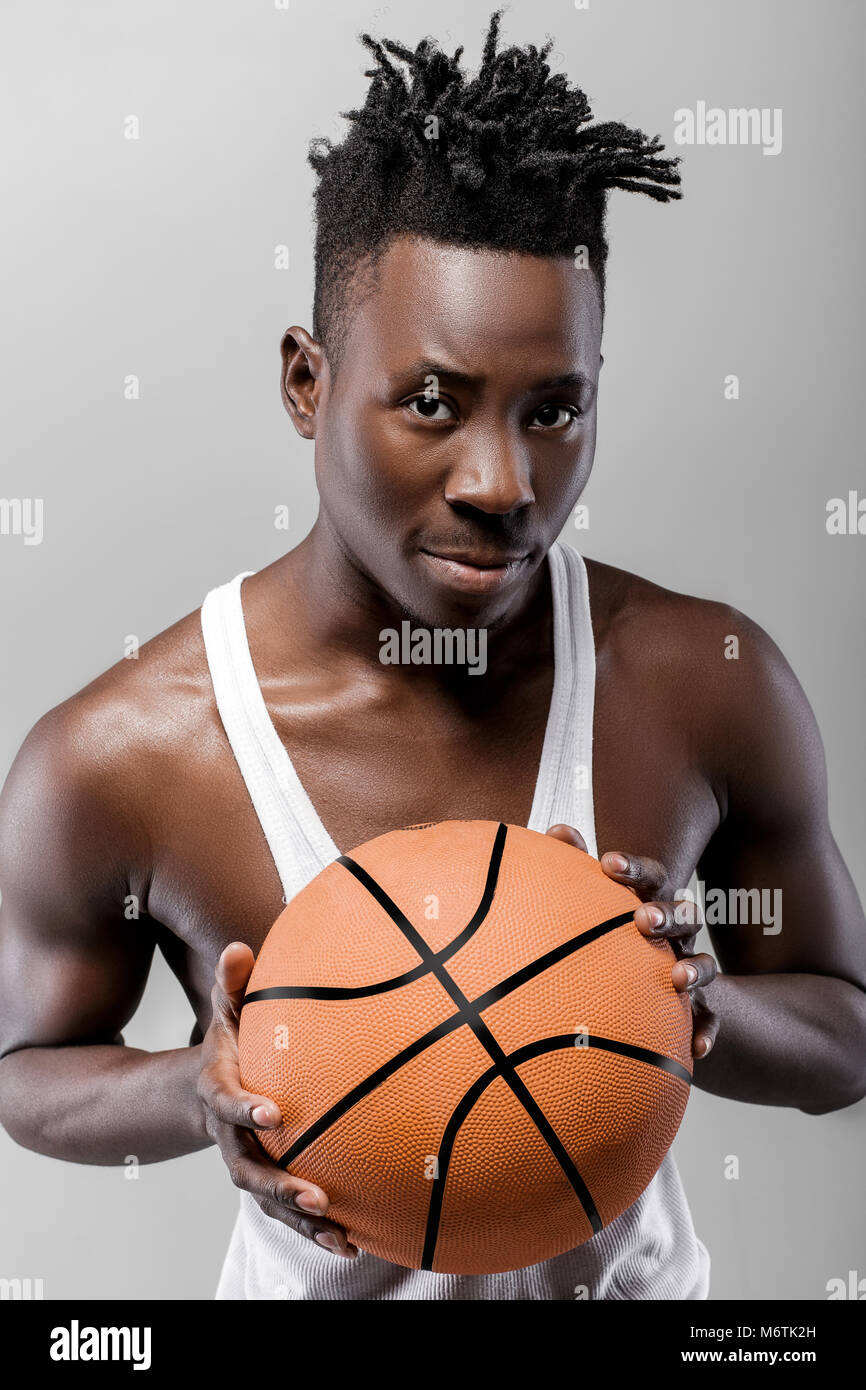 African-American man with basketball Stock Photo - Alamy