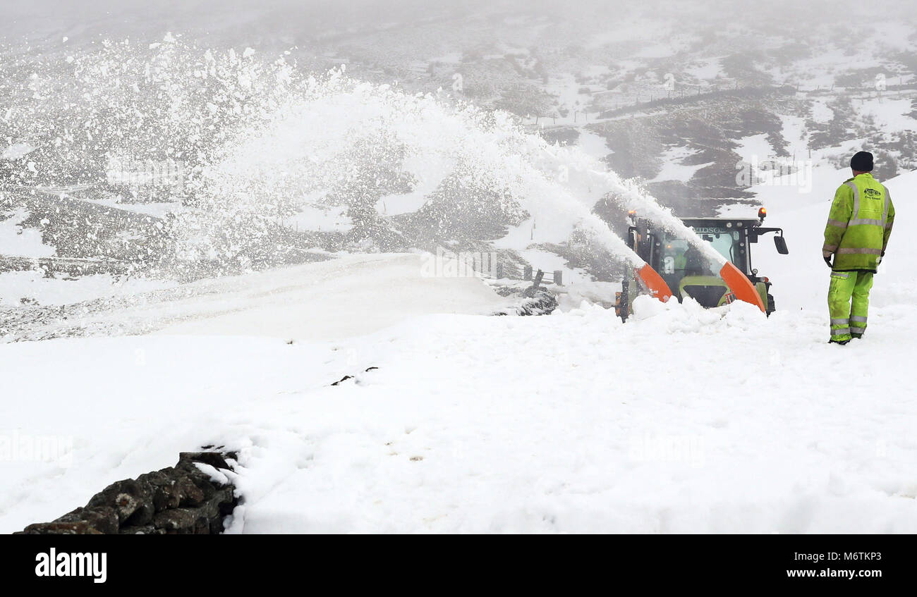 A snow blower in Nenthead, Cumbria clears the roads Stock Photo - Alamy