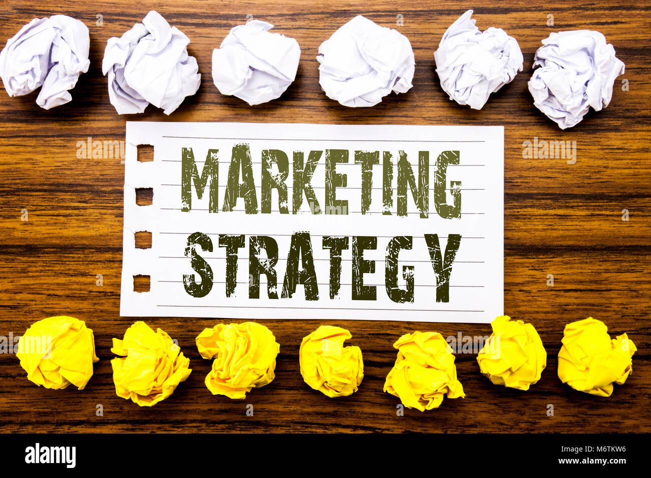 Handwritten text showing Marketing Strategy. Business concept for ...
