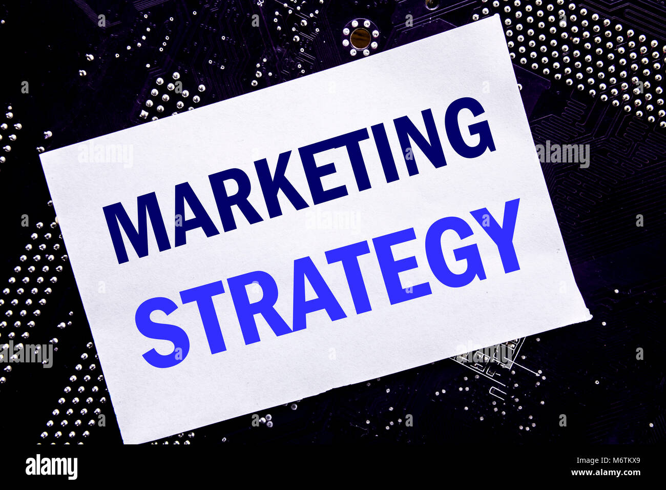 Handwritten text showing Marketing Strategy. Business concept for ...