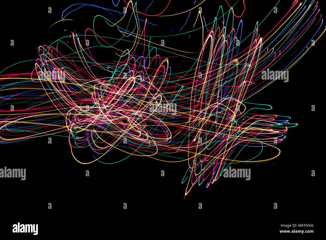 crazy shapes neon light for computer background Stock Photo - Alamy