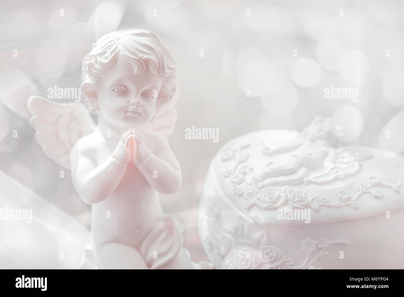 Baby angel statuette Stock Photo - Alamy
