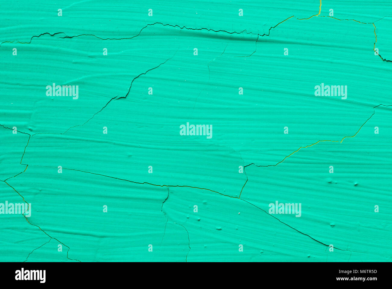 green color cracked painted background texture Stock Photo - Alamy