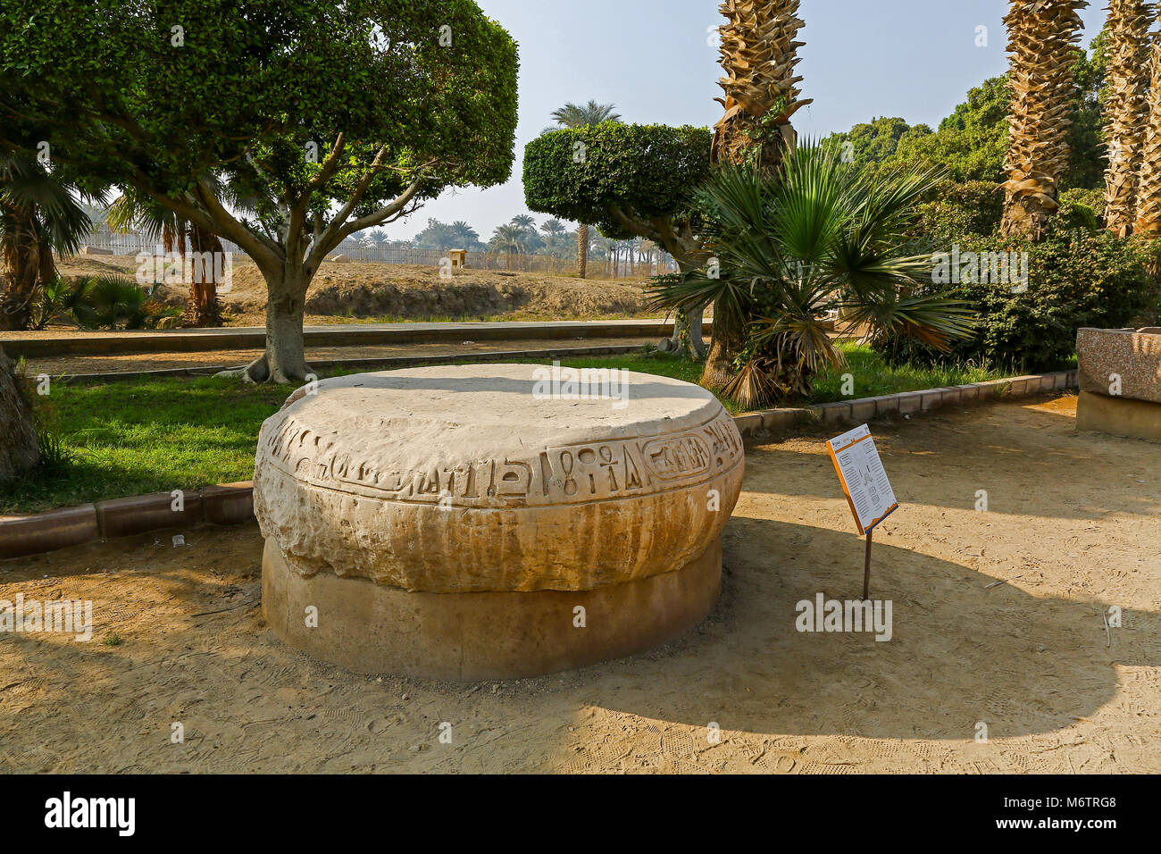 Two inscribed and carved limestone column bases from the throne room of ...