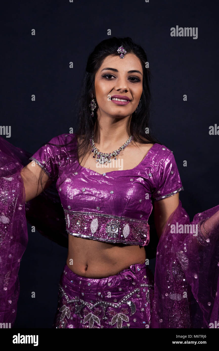Portrait of smiling beautiful indian girl. young female model wears ...